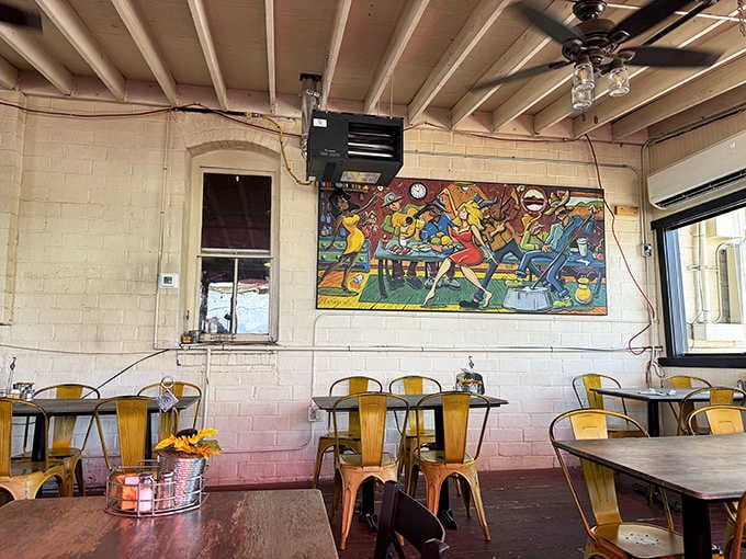 That colorful mural isn't just decoration, it's Jerome's artistic soul watching over your barbecue feast with approval.
