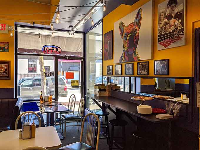 Yellow walls and comic art create an atmosphere where eating lunch feels like stepping into your favorite graphic novel.