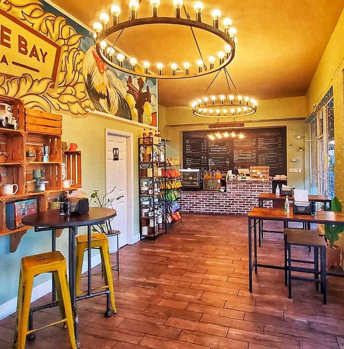 Step inside and you're greeted by warm lighting and cheerful yellow accents that make mornings feel less offensive.