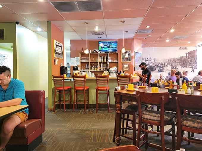 Vintage photographs on the walls and warm lighting create the kind of atmosphere where strangers become breakfast buddies over coffee.