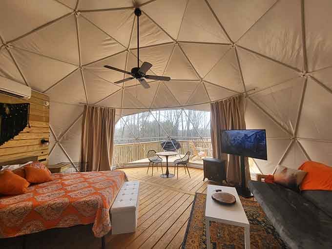 Inside, you'll find actual furniture and a ceiling fan, because roughing it shouldn't mean suffering unnecessarily.