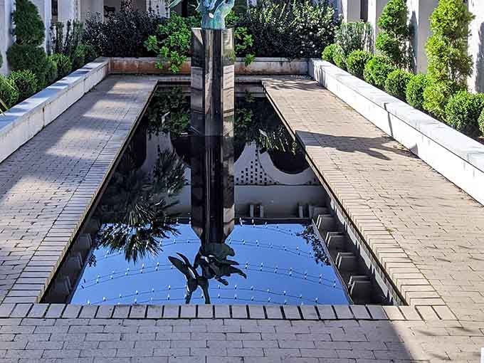 These reflecting pools turn sculptures into mirror images, doubling your art appreciation without doubling the admission price.