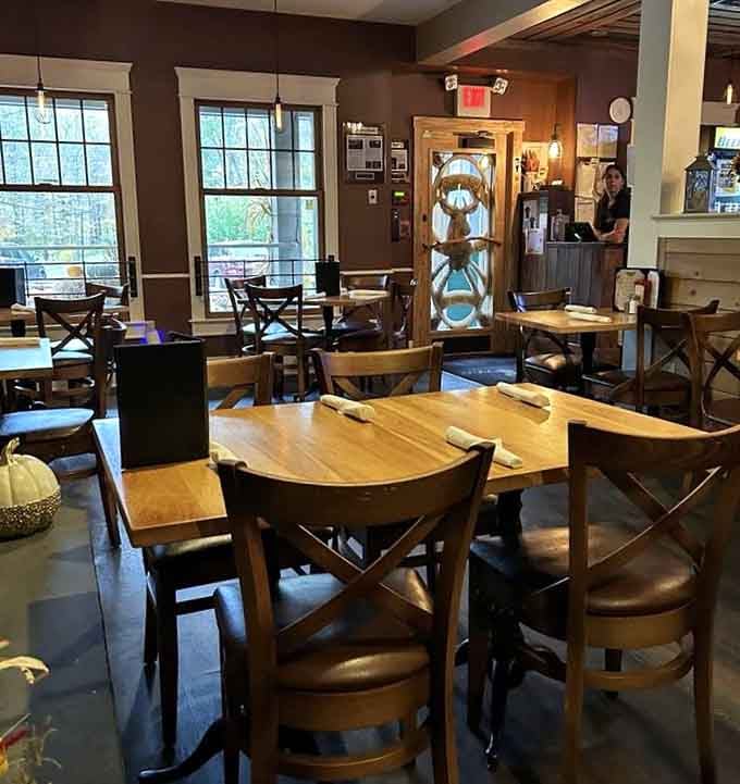 Wood tables, natural light, and brewing tanks you can actually see equals transparency in action.