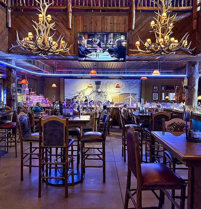 Cathedral ceilings, antler chandeliers, and overhead train tracks create the most wonderfully eccentric dining room you'll ever experience.