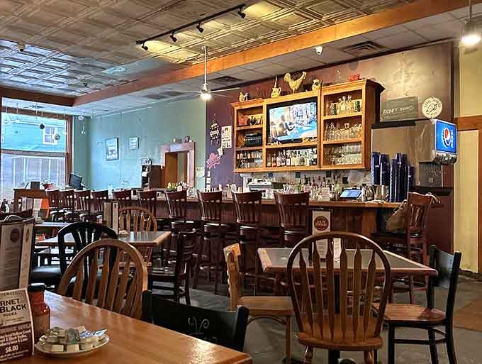 Inside, it's cozy chaos in the best way, with tin ceilings and mismatched charm everywhere.