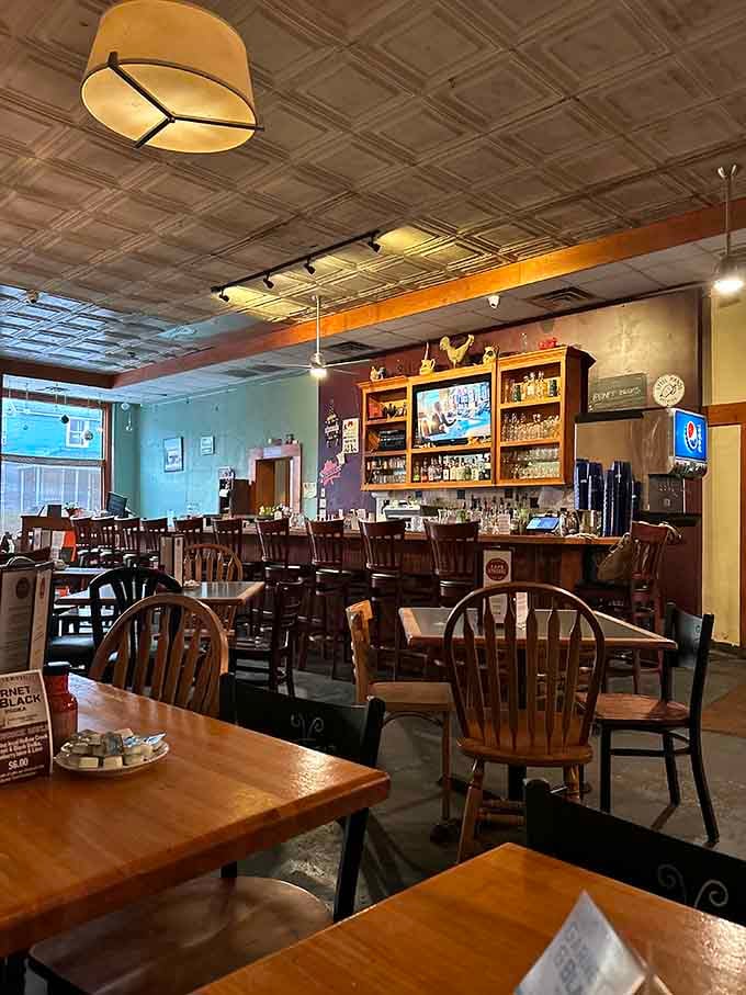 Step inside and you'll find a welcoming space where tin ceilings meet wooden tables and morning magic.