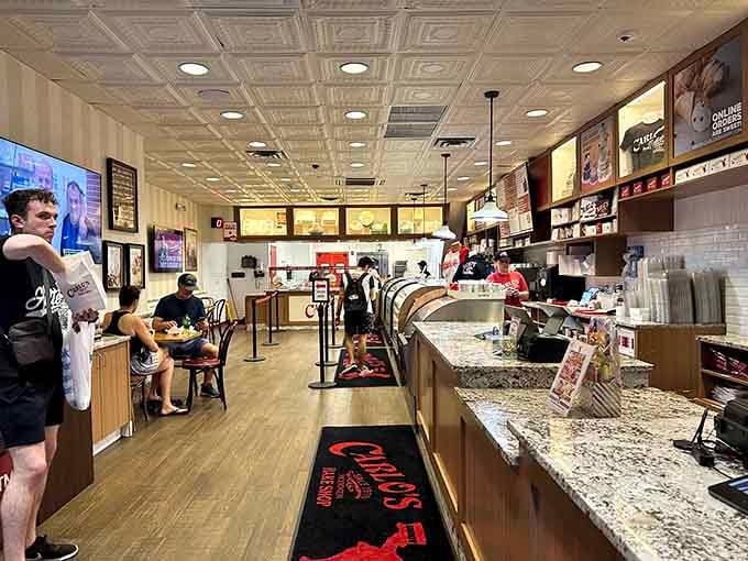 Step inside where the decorative tin ceiling meets modern efficiency, and every surface gleams with the promise of sugar-fueled happiness.