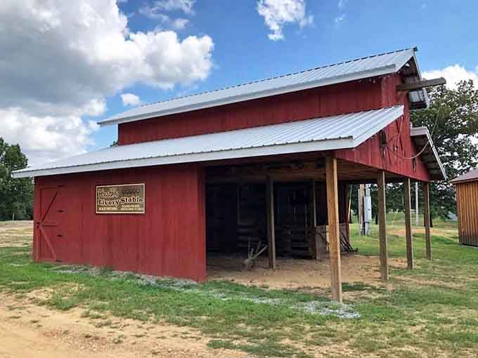 The Heath Livery Stable stands ready to house horses and equipment, its red barn construction perfectly capturing that rustic frontier spirit.