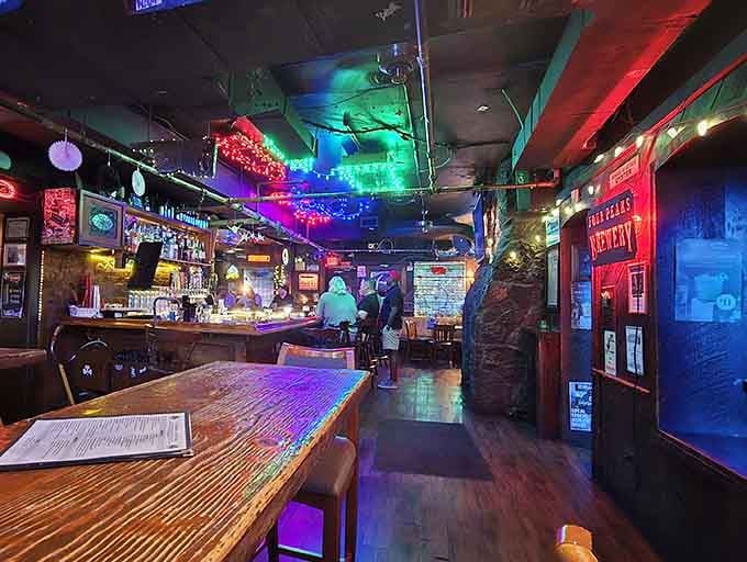Neon lights dancing across vintage wood and brick, this bar has more personality than most people you know.