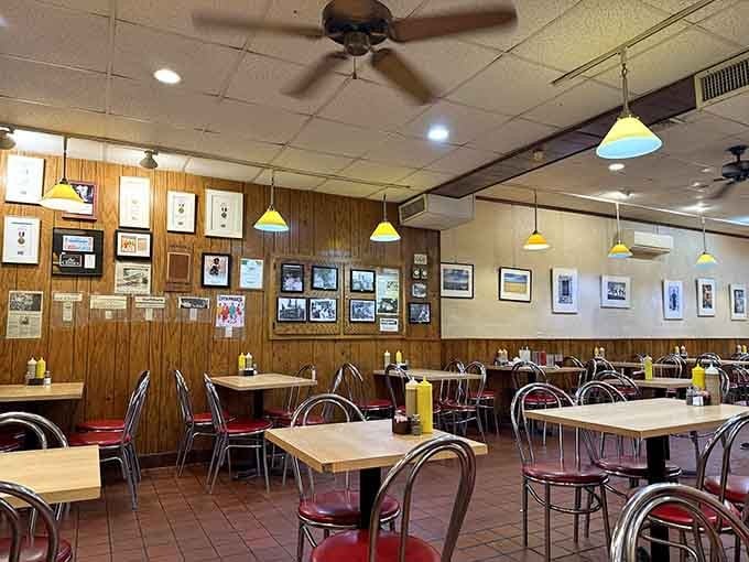 Wood paneling, ceiling fans, and framed memories create the perfect backdrop for serious sandwich contemplation and even more serious eating.