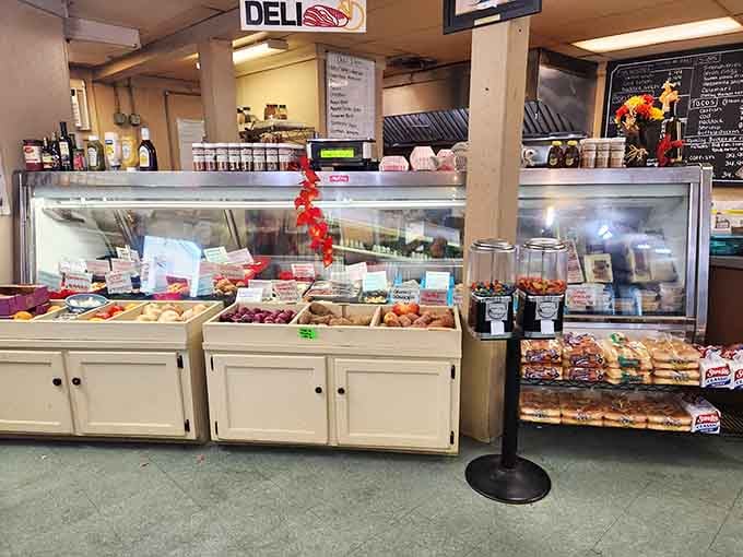 Fresh seafood gleaming behind glass like edible jewelry, ready to become your dinner or theirs.