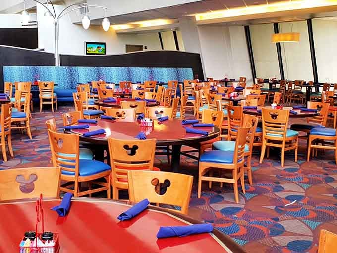 Bright colors and Mickey silhouettes everywhere make this dining room feel like a celebration before you've taken a single bite.