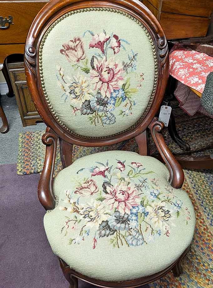 Someone's grandmother lovingly stitched those flowers decades ago, and now it's waiting for its next story.