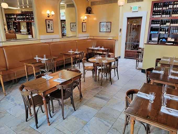 Simple wooden tables and warm lighting create the perfect setting for a meal you'll remember long after leaving.