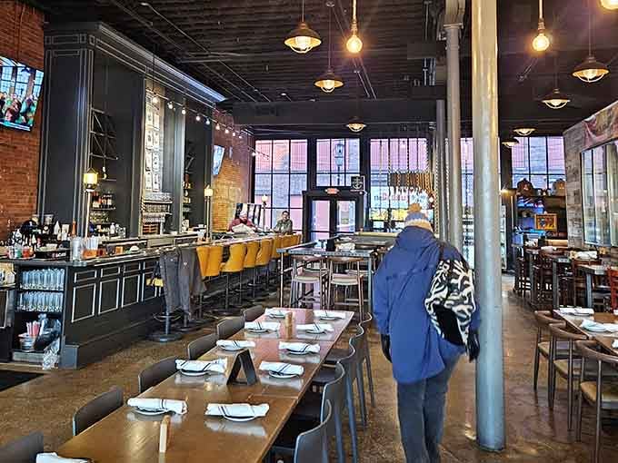 Industrial chic meets neighborhood warmth in this beautifully designed space where exposed brick tells Cleveland's story with every meal.