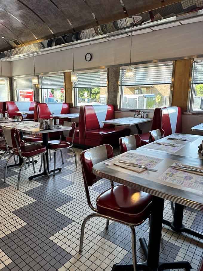 Step inside and the 1950s don't just whisper, they sing through every polished surface and vinyl booth.