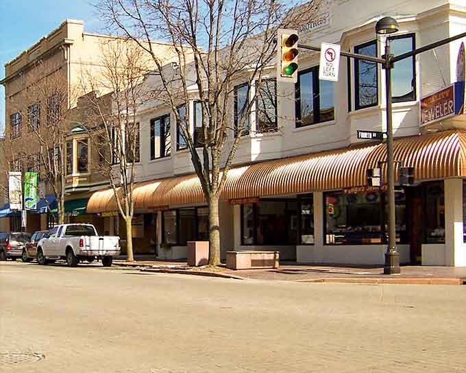 Those striped awnings add just enough vintage charm to balance all the contemporary cool happening around them.