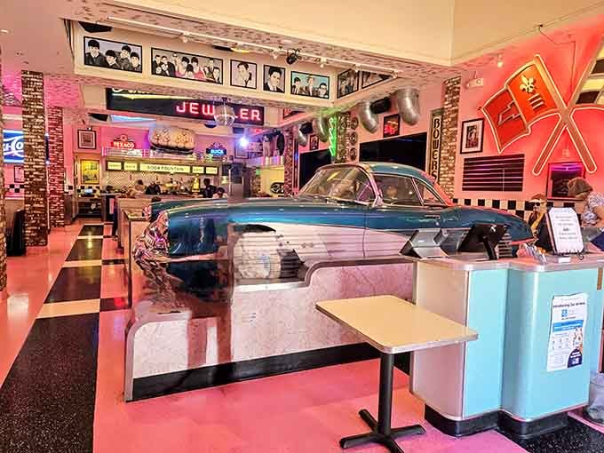 That's a real Corvette serving as your dining companion&mdash;because regular booths are for people without imagination or flair.