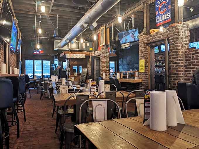Exposed brick, industrial ductwork, and Cubs flags create an atmosphere that's equal parts sophisticated and comfortable.