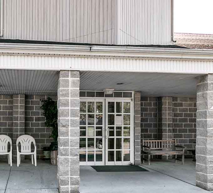 Those elegant French doors frame the entrance perfectly, inviting you into a world where the past feels wonderfully present.