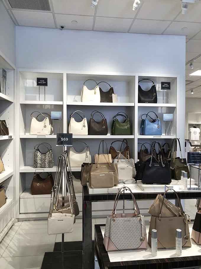 Handbags arranged like art in a gallery, except these masterpieces won't require a second mortgage.