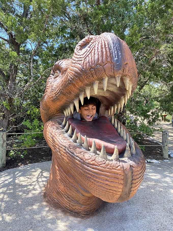 Nothing says "family photo op" quite like sticking your head in a T-Rex's mouth and living to tell about it.