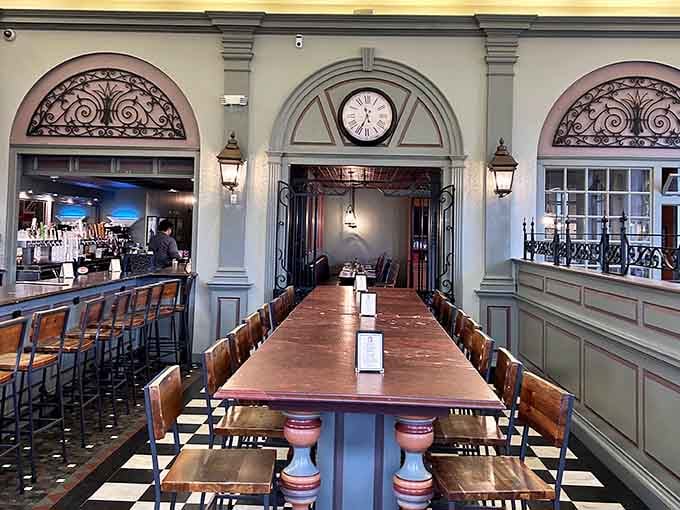 Those soaring arched doorways and ornate ironwork above them whisper stories of financial transactions past while you enjoy your present-day pint.