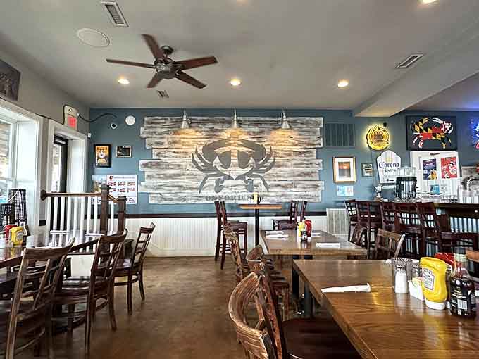 Coastal charm meets comfort food in a dining room where weathered wood and nautical touches feel genuine.