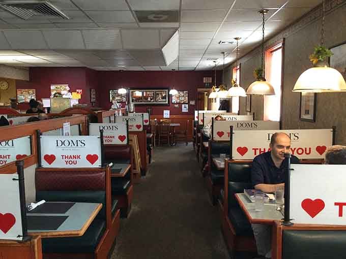 Classic booth seating and warm lighting create the kind of diner atmosphere where time slows down deliciously.