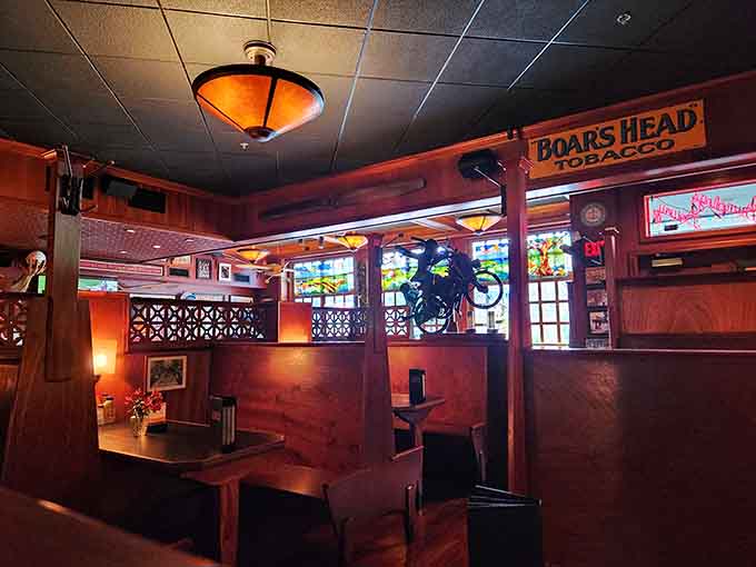 Wood paneling, vintage signs, and a model airplane overhead &ndash; this place collects memories like some people collect stamps.