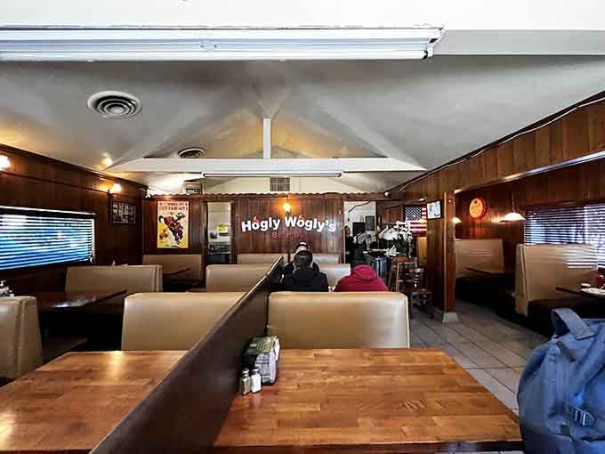 Wood paneling and cozy booths set the stage for a serious barbecue feast in classic style.