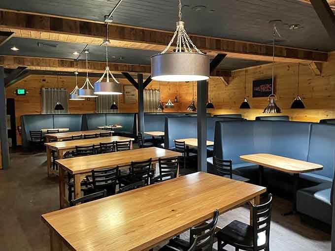 Clean lines, warm wood, and booth seating that actually looks comfortable instead of punishing your spine.