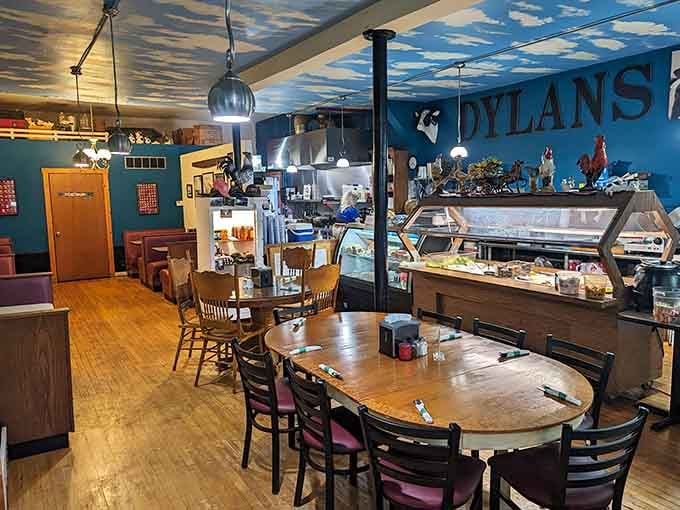 Step inside where blue walls meet wooden tables and that ice cream case beckons like a siren song.