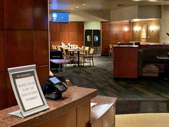 Booth seating and warm lighting create the perfect atmosphere for contemplating your third dessert plate without judgment.