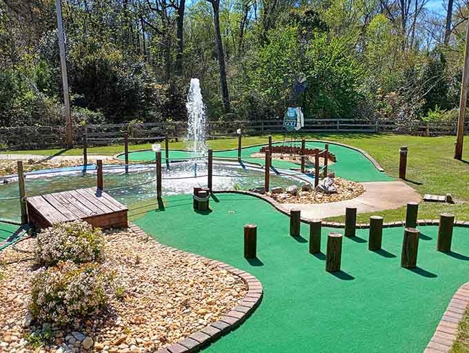 Wooden bridges and shooting fountains transform ordinary mini golf into an actual outdoor adventure worth experiencing.
