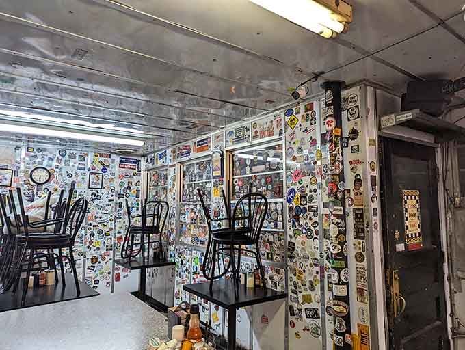 Every square inch tells a story, from vintage beer signs to university stickers spanning generations of breakfast lovers.