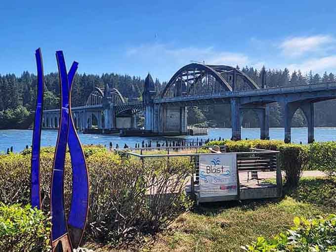 That bridge isn't just functional, it's basically showing off with those Art Deco curves and waterfront views.
