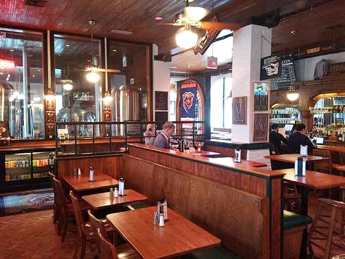 Inside, the original woodwork and brewing tanks create a space where history meets hops perfectly.