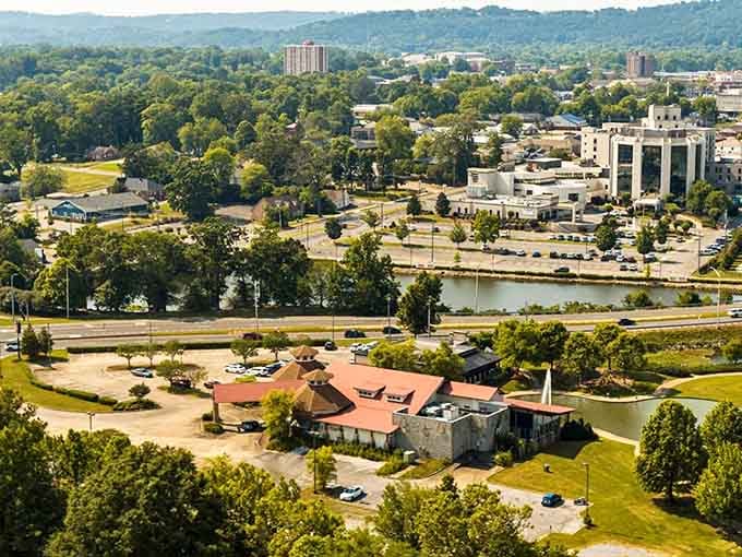 The Coosa River winds through town like nature's own highway, offering views that don't cost a subscription fee.