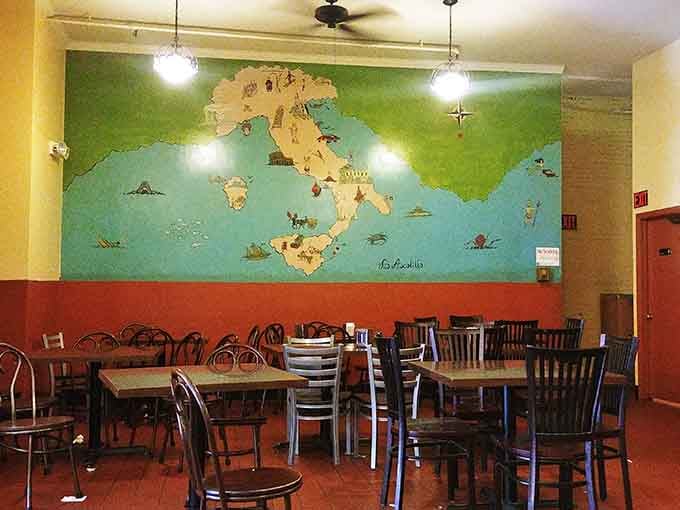Simple tables, incredible food, and a map of Italy reminding you where all this deliciousness originated.
