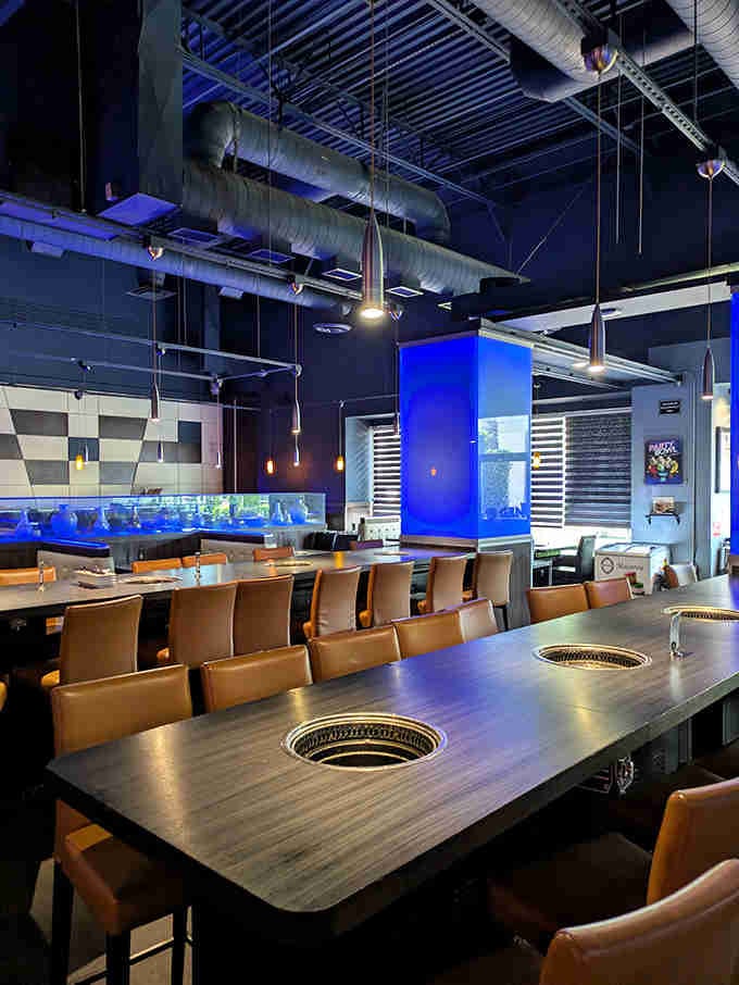 Industrial chic meets Korean BBQ brilliance with those overhead vents working harder than your New Year's gym resolution.