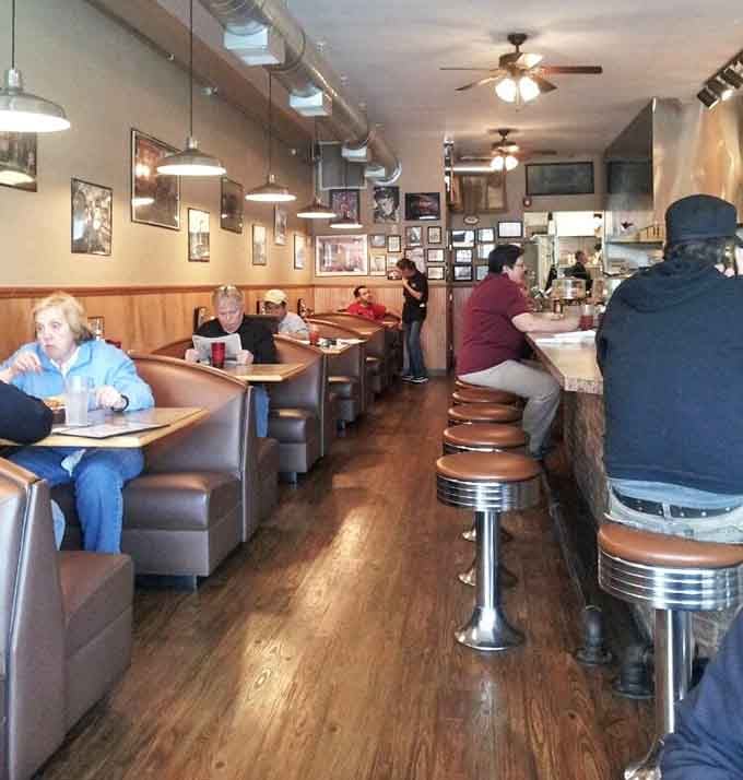 Classic counter stools and cozy booths create the perfect setting where strangers become regulars over breakfast.