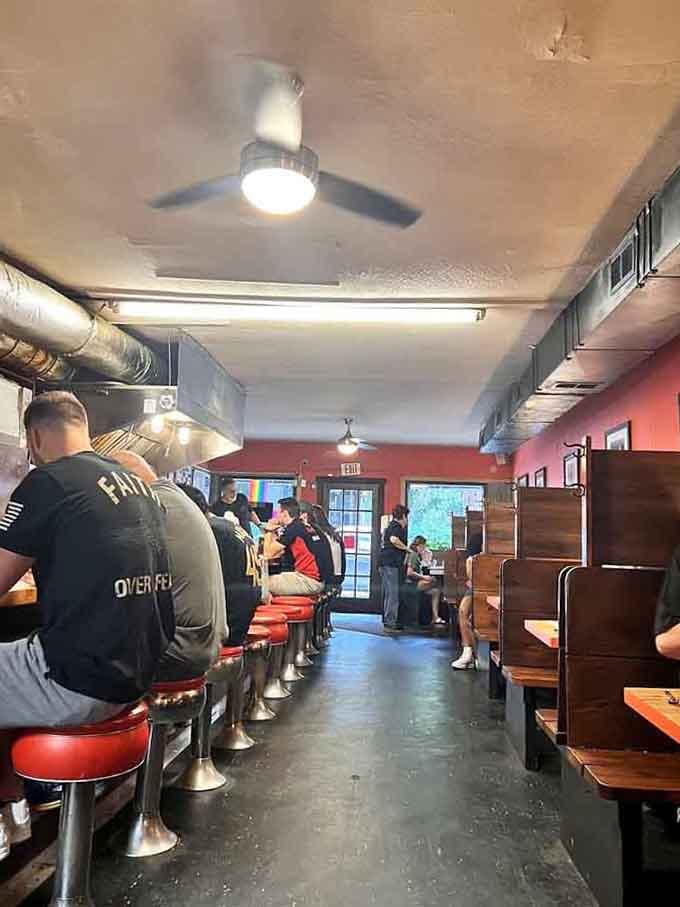 Red walls, spinning stools, and the comforting hum of breakfast conversation, this is diner perfection realized.