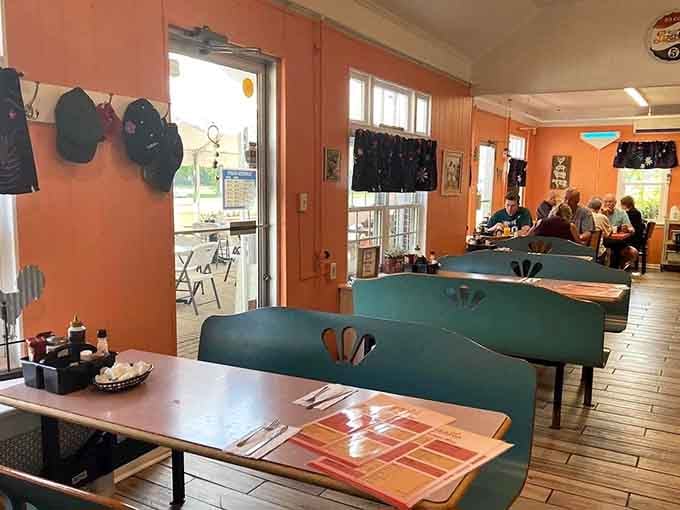 Retro booths and warm colors create the kind of atmosphere where conversations flow as freely as the coffee refills.