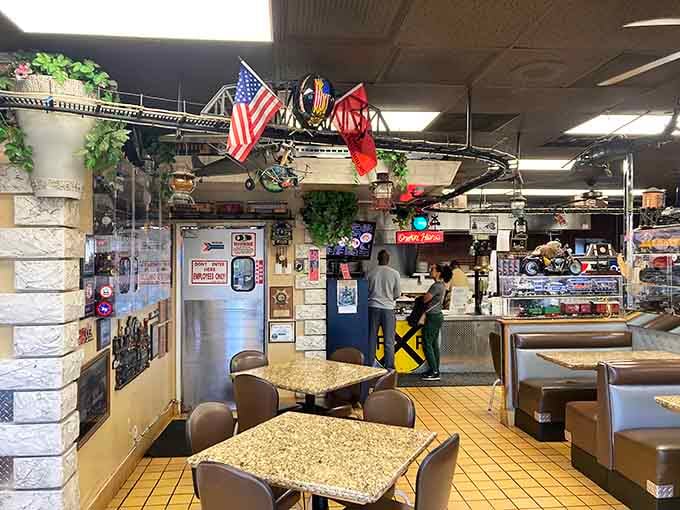 Model trains circle overhead while you contemplate life's important decisions, like pancakes versus waffles or maybe both.