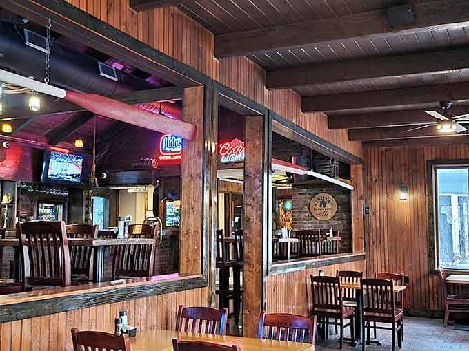 Wood-paneled walls and comfortable seating create that perfect casual atmosphere where everyone feels right at home.