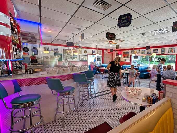 Chrome, neon, and checkered floors create a time capsule where the coffee's always hot and worries melt away.