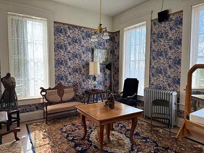 Period wallpaper and vintage furniture create an atmosphere so authentic, you'll forget what century you're in until something moves.