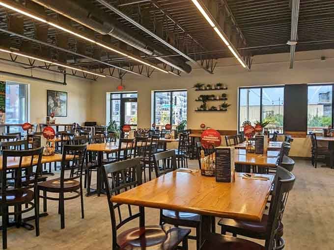 The dining room whispers "stay awhile" with natural light and wood accents that make lingering absolutely mandatory.