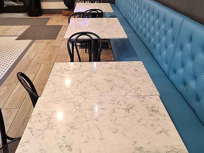Turquoise booths and marble tables create a cheerful diner vibe where donut dreams are discussed and devoured with equal enthusiasm.